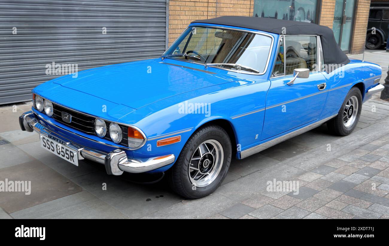Front view of blue Triumph Stag sports tourer Stock Photo - Alamy