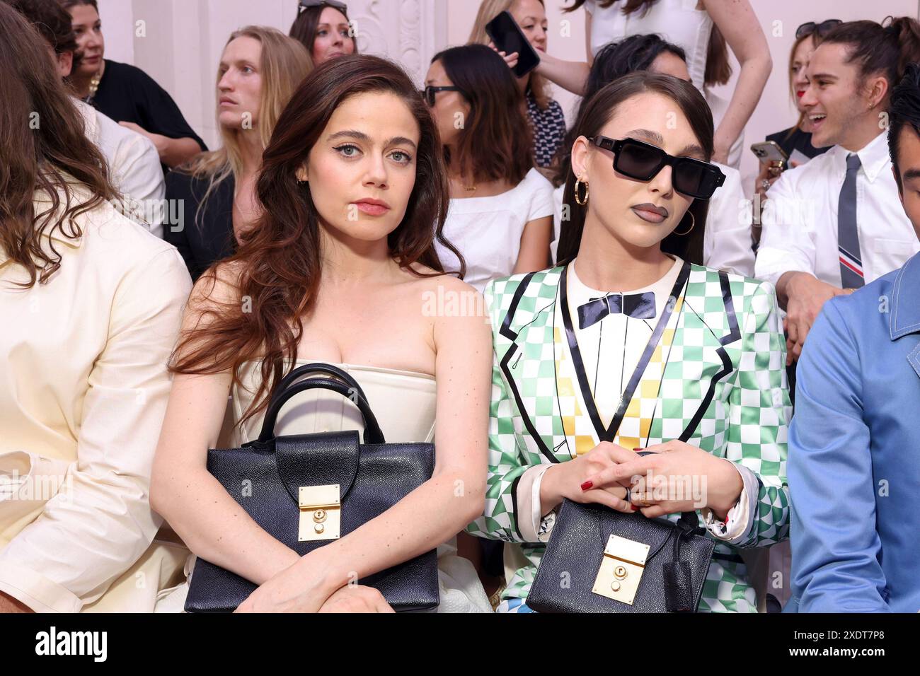 Molly Gordon, left, and Emma Chamberlain pose for photographers at the ...
