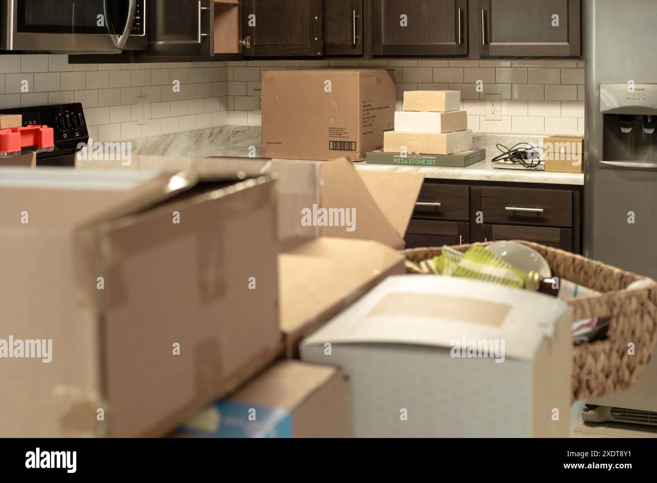 A footage of an apartment kitchen with loaded Boxes for moving Stock ...