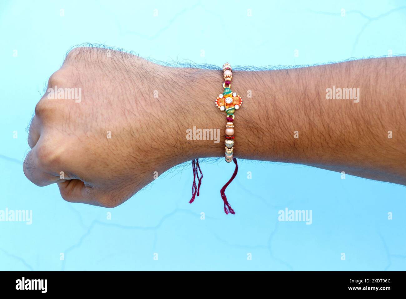 Brother showing rakhi on his hand on an occasion of Raksha Bandhan ...