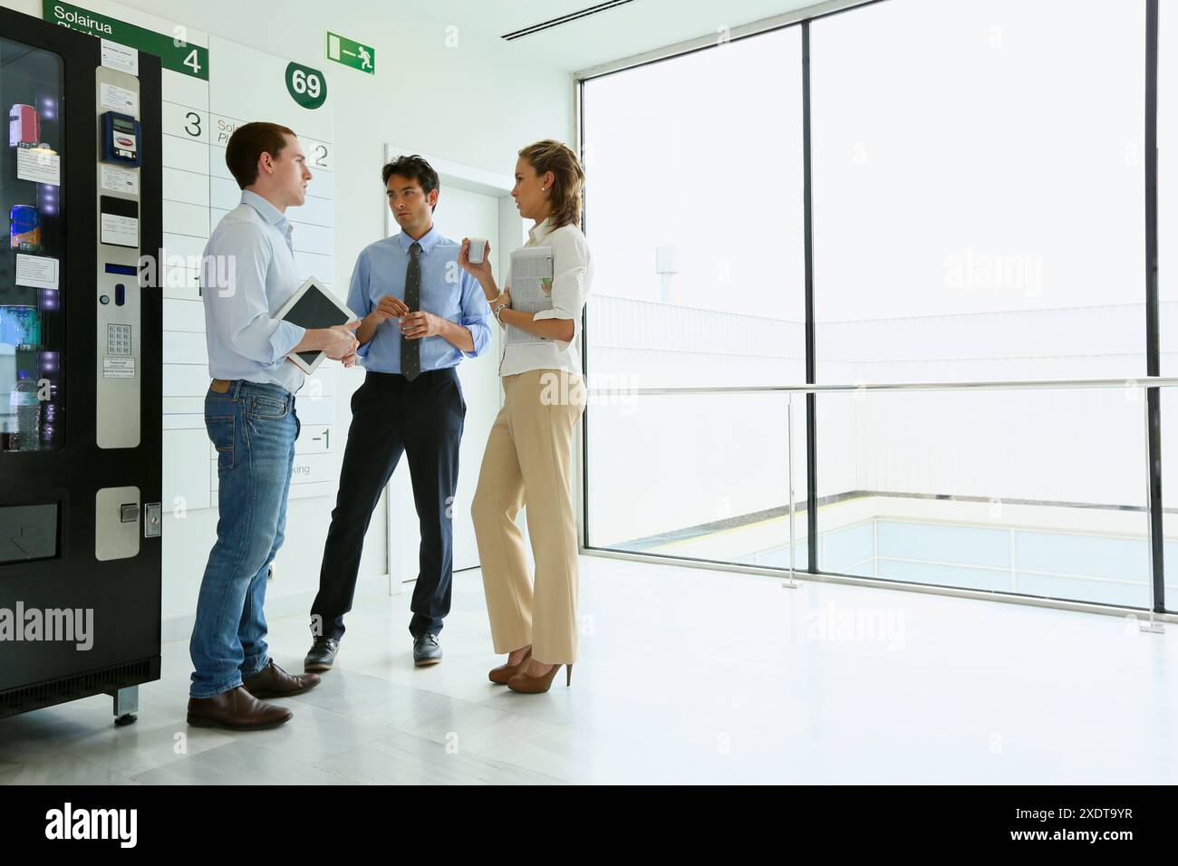 Office workers taking a break Stock Photo - Alamy