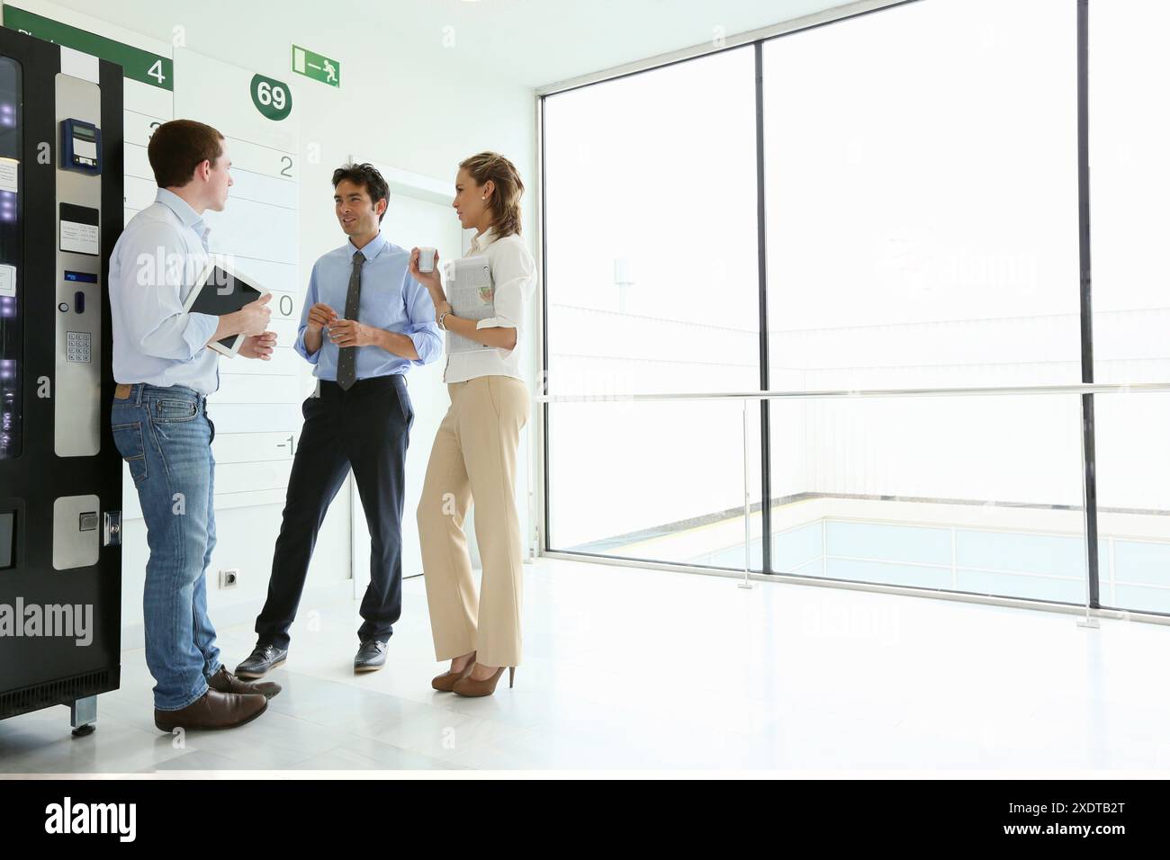 Office workers taking a break Stock Photo - Alamy