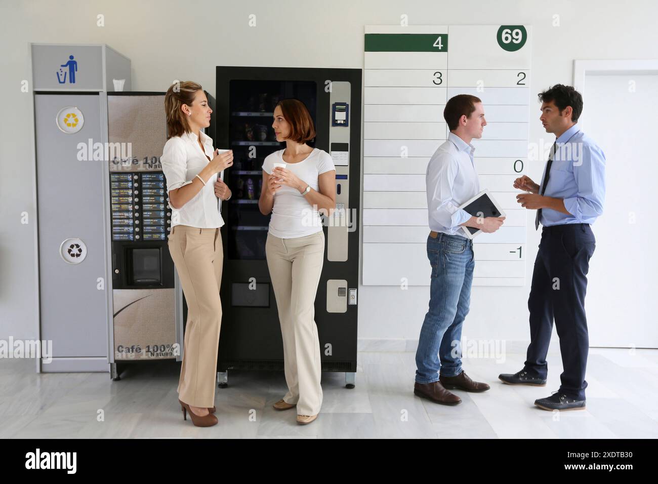 Office workers taking a break Stock Photo - Alamy