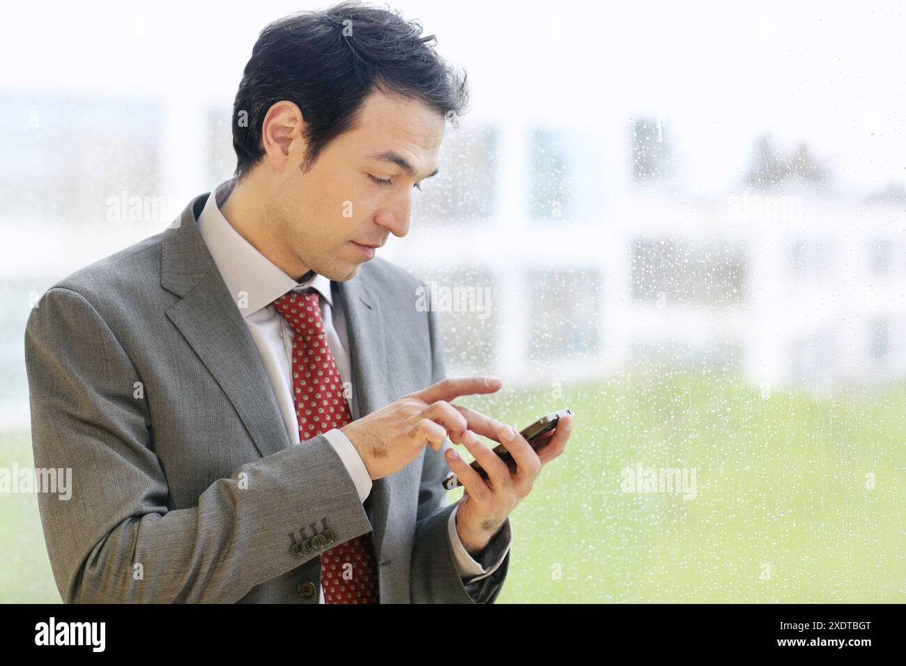Businessman using cell phone 30 40 years hi-res stock photography and ...