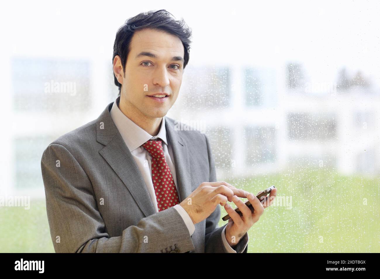 Businessman using cell phone 30 40 years hi-res stock photography and ...