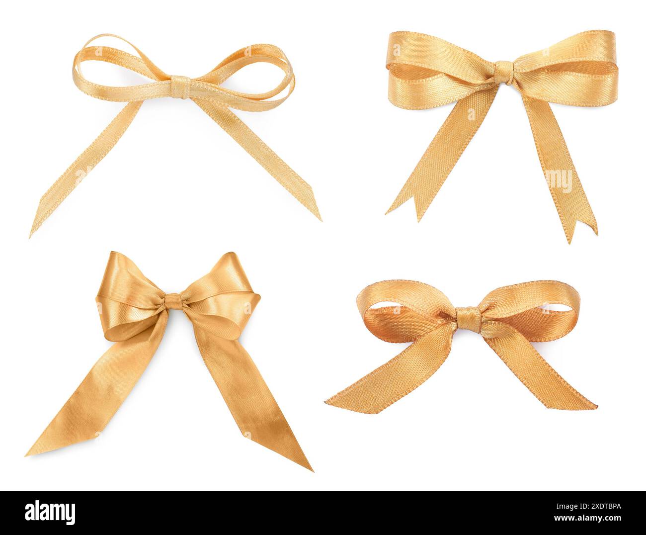 Beautiful golden bows isolated on white, set Stock Photo - Alamy