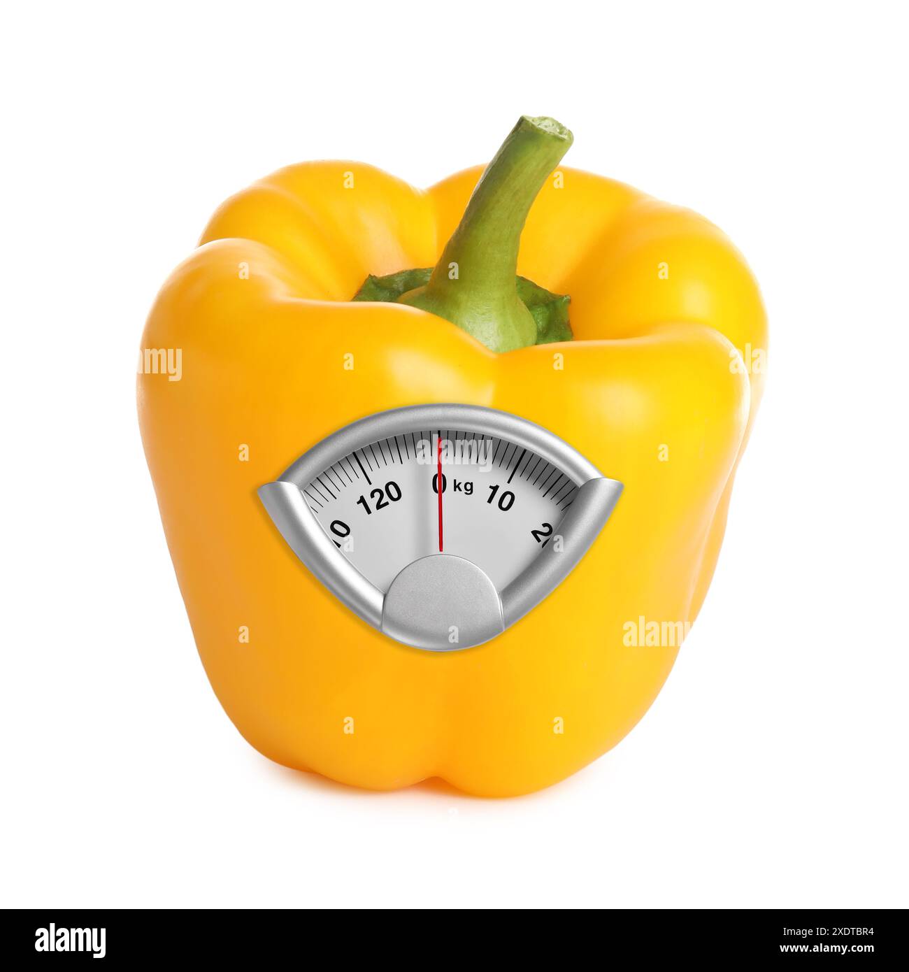 Yellow bell pepper with analog weighing scale display isolated on white ...
