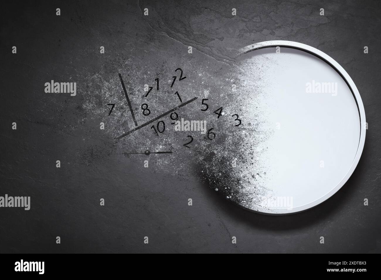 Analog clock dissolving on dark background. Time is running out Stock ...