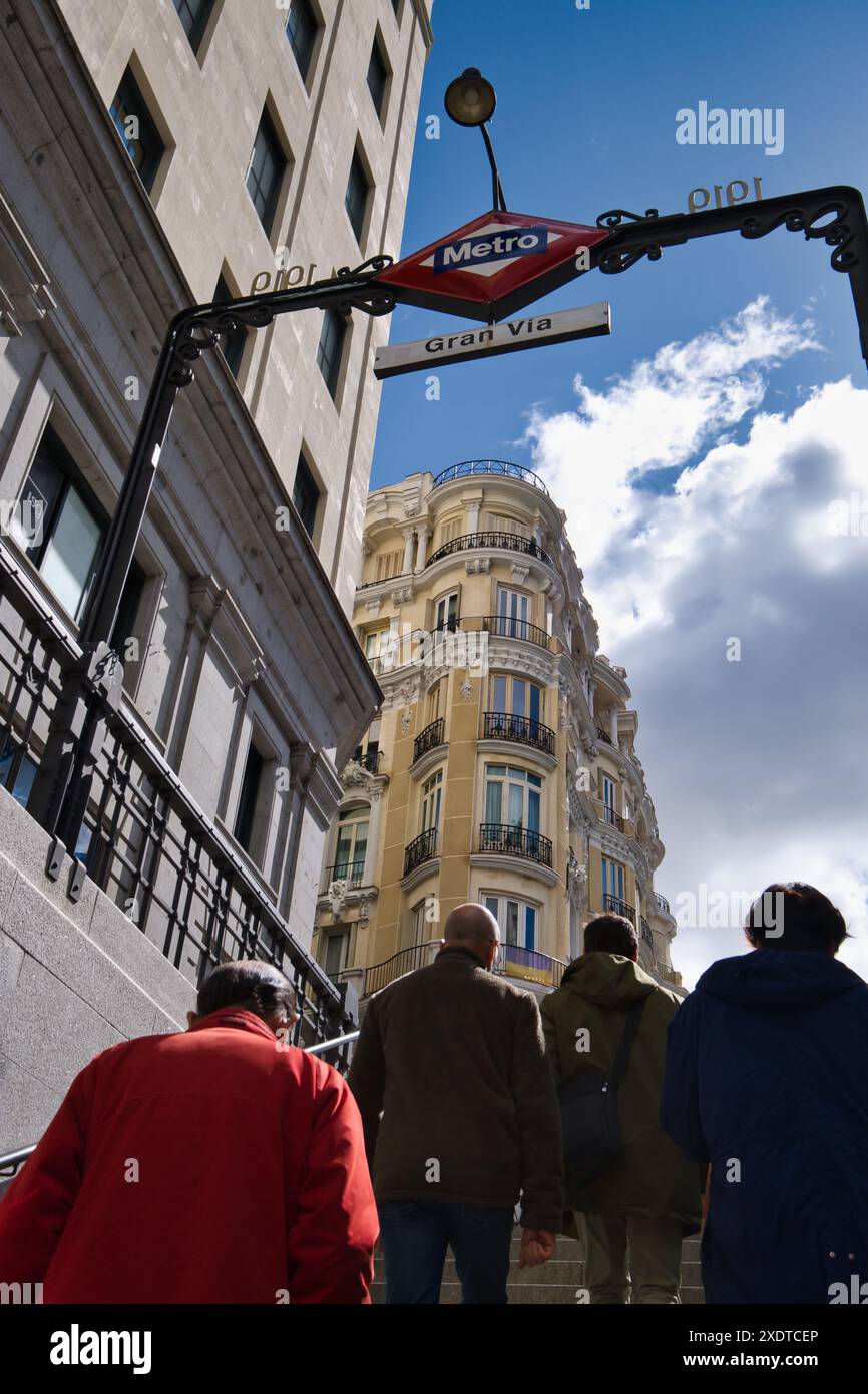Back view of people getting out from the underground in Madrid Stock ...