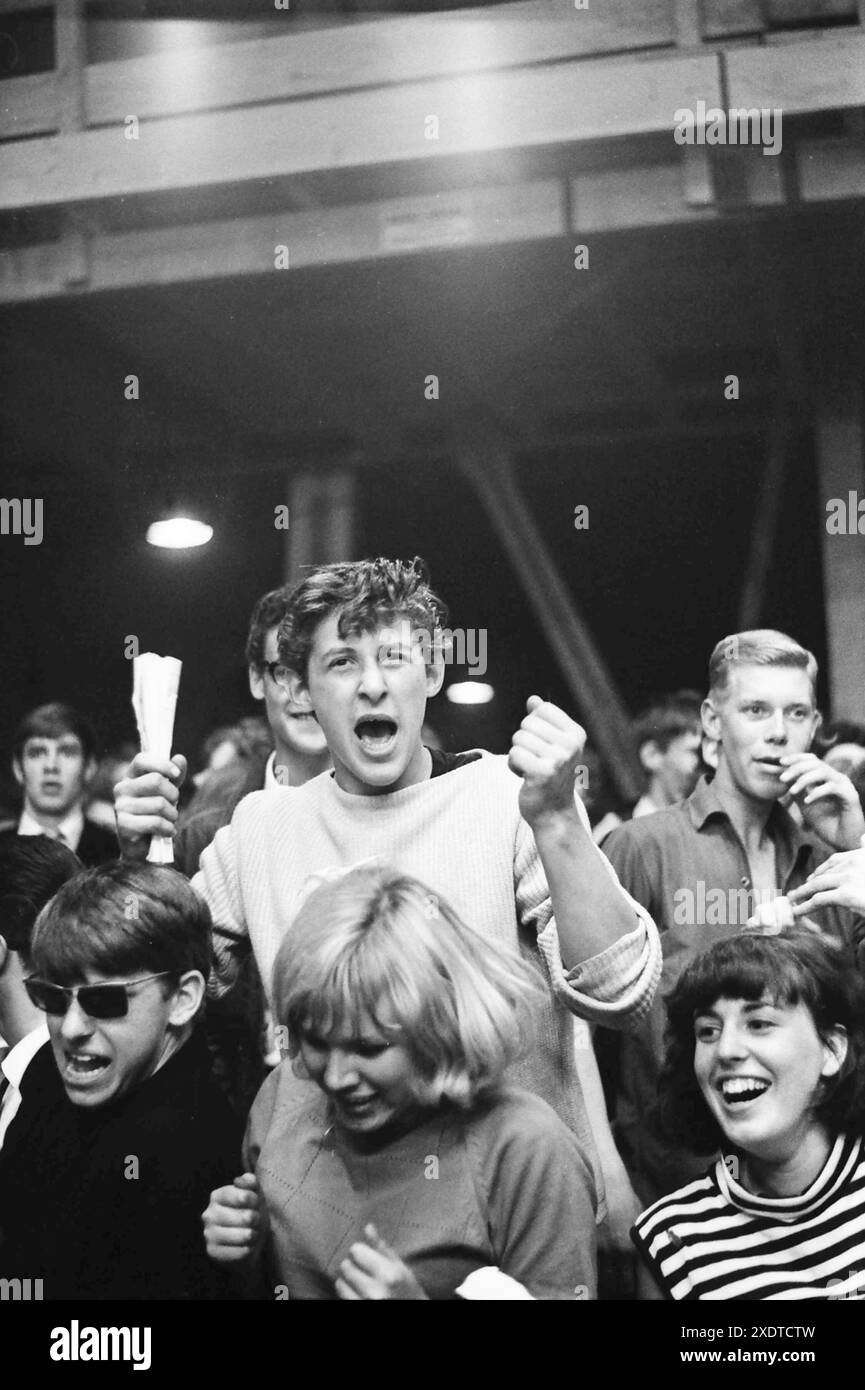 Beatlemania - A Beatle fan goes crazy at the Beatles' performance in ...