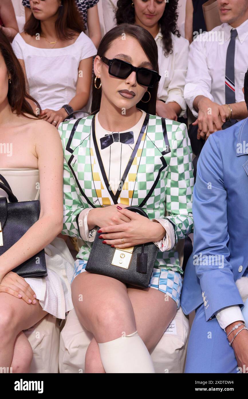 Emma Chamberlain poses for photographers at the Thom Browne Haute ...