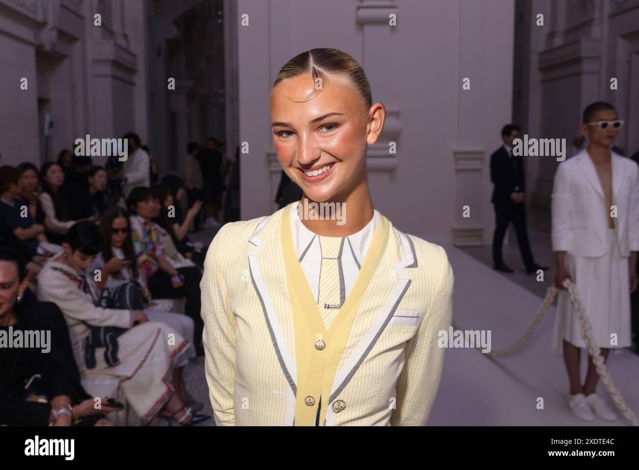 Mia Regan poses for photographers at the Thom Browne Haute Couture Fall ...