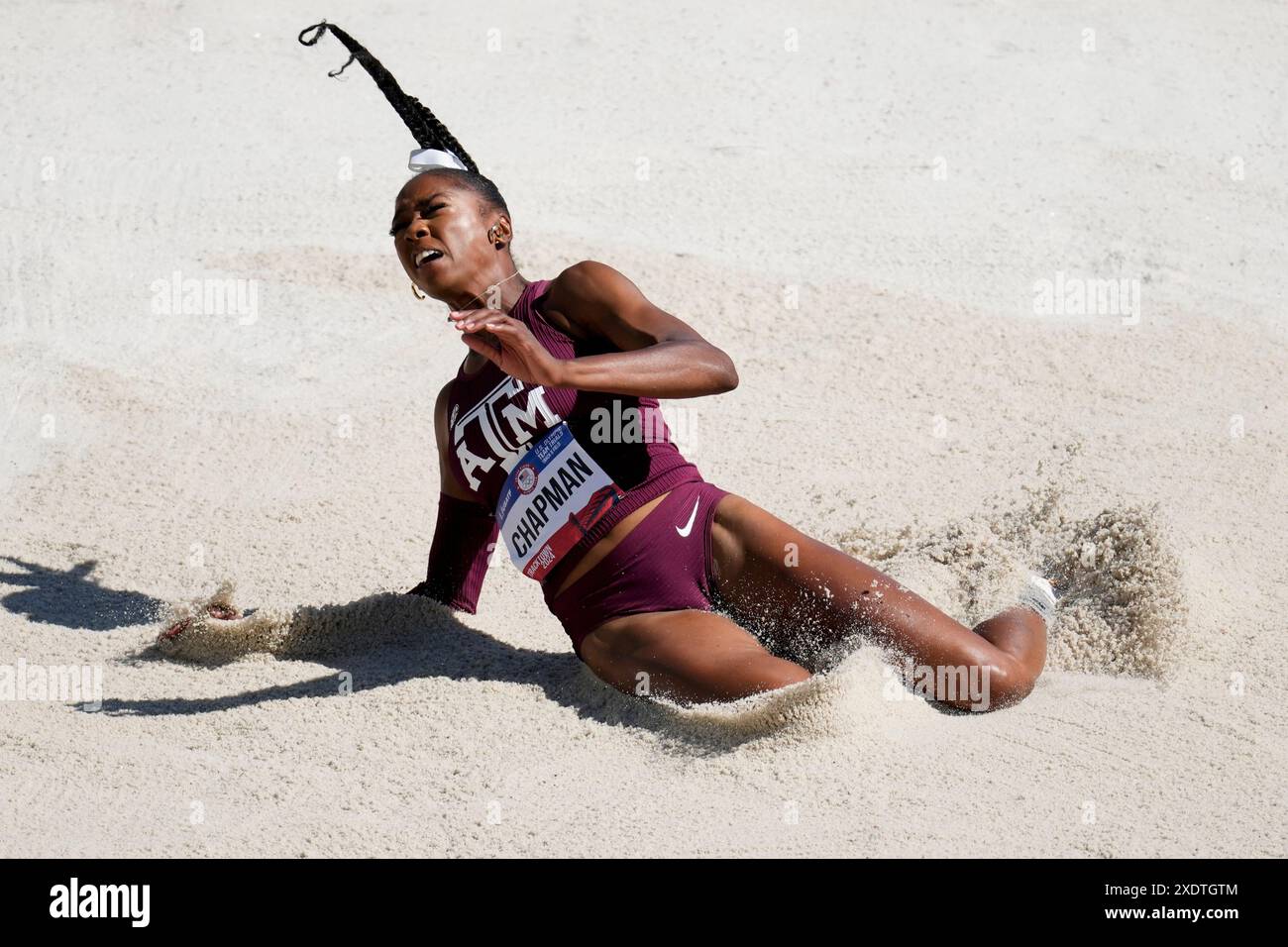 Timara Chapman competes in the women's heptathlon long jump during the ...
