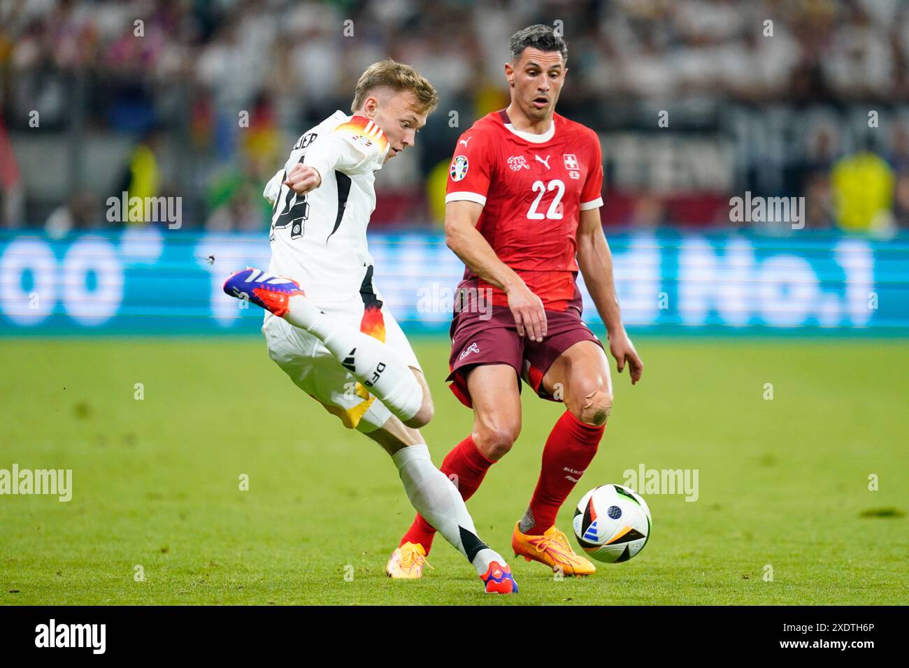 Maximilian Beier of Germany and Fabian Schar of Switzerland during the ...