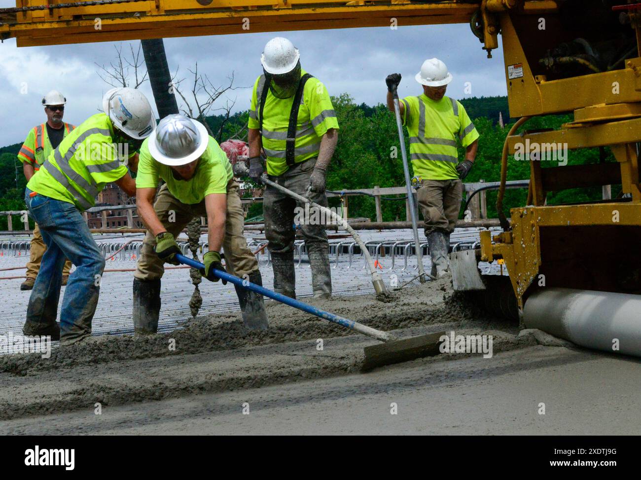 Crews pour the decking of the General John Stark Memorial Bridge ...