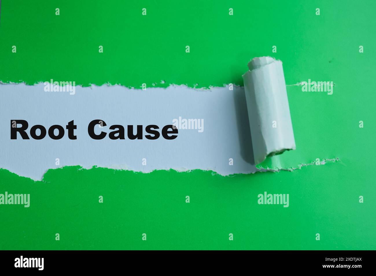 Concept of Root Cause Text written in torn paper Stock Photo - Alamy