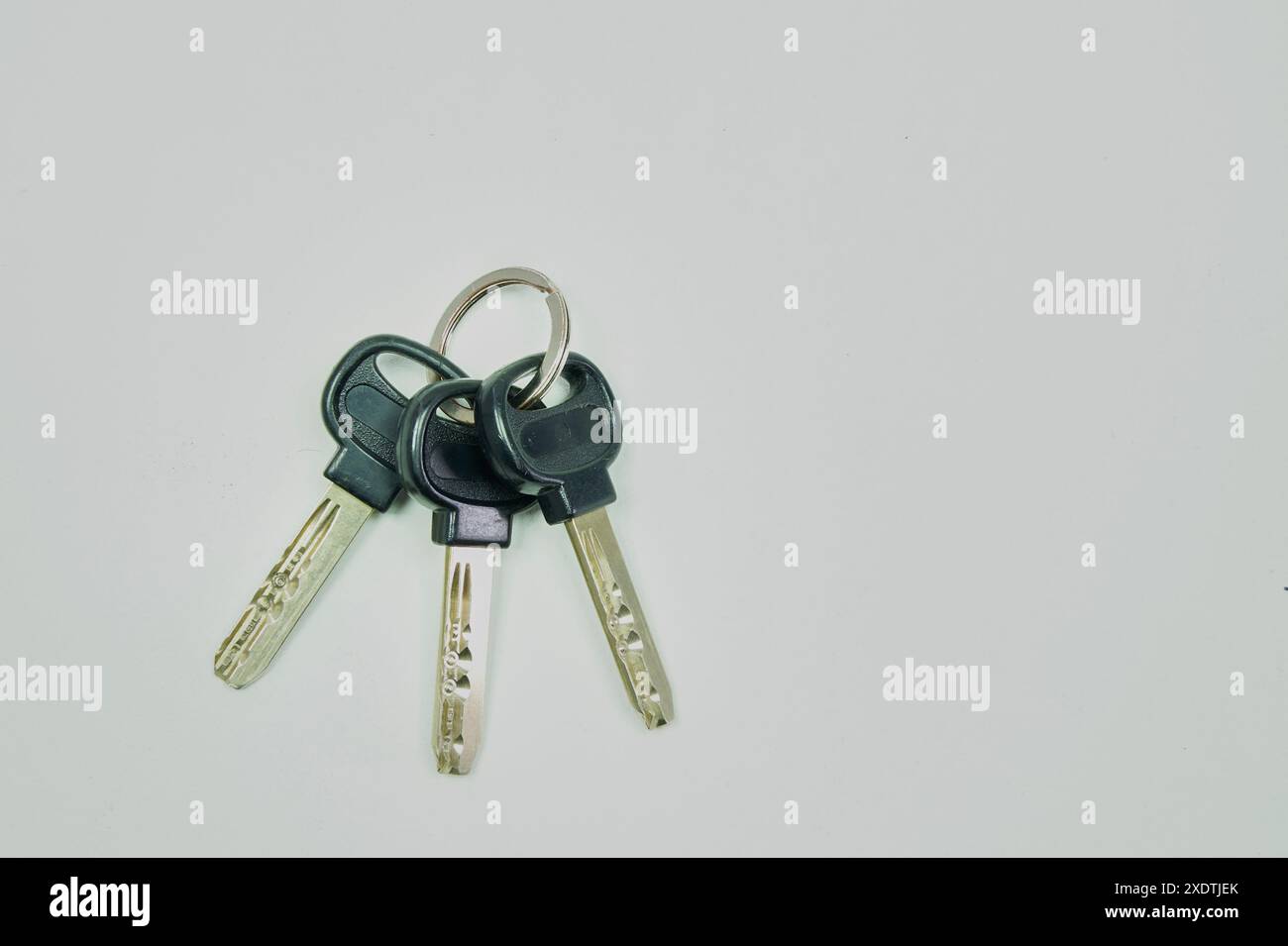 High security key with black insulator on white background Stock Photo ...