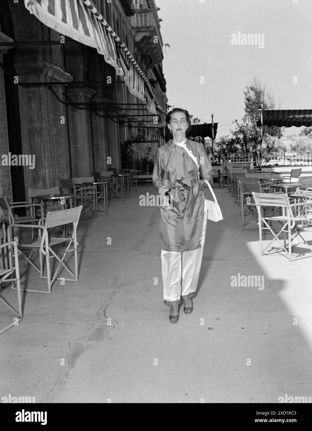 Barbara Hutton Troubetzkoy, Woolworth heiress, wears white slacks and a ...