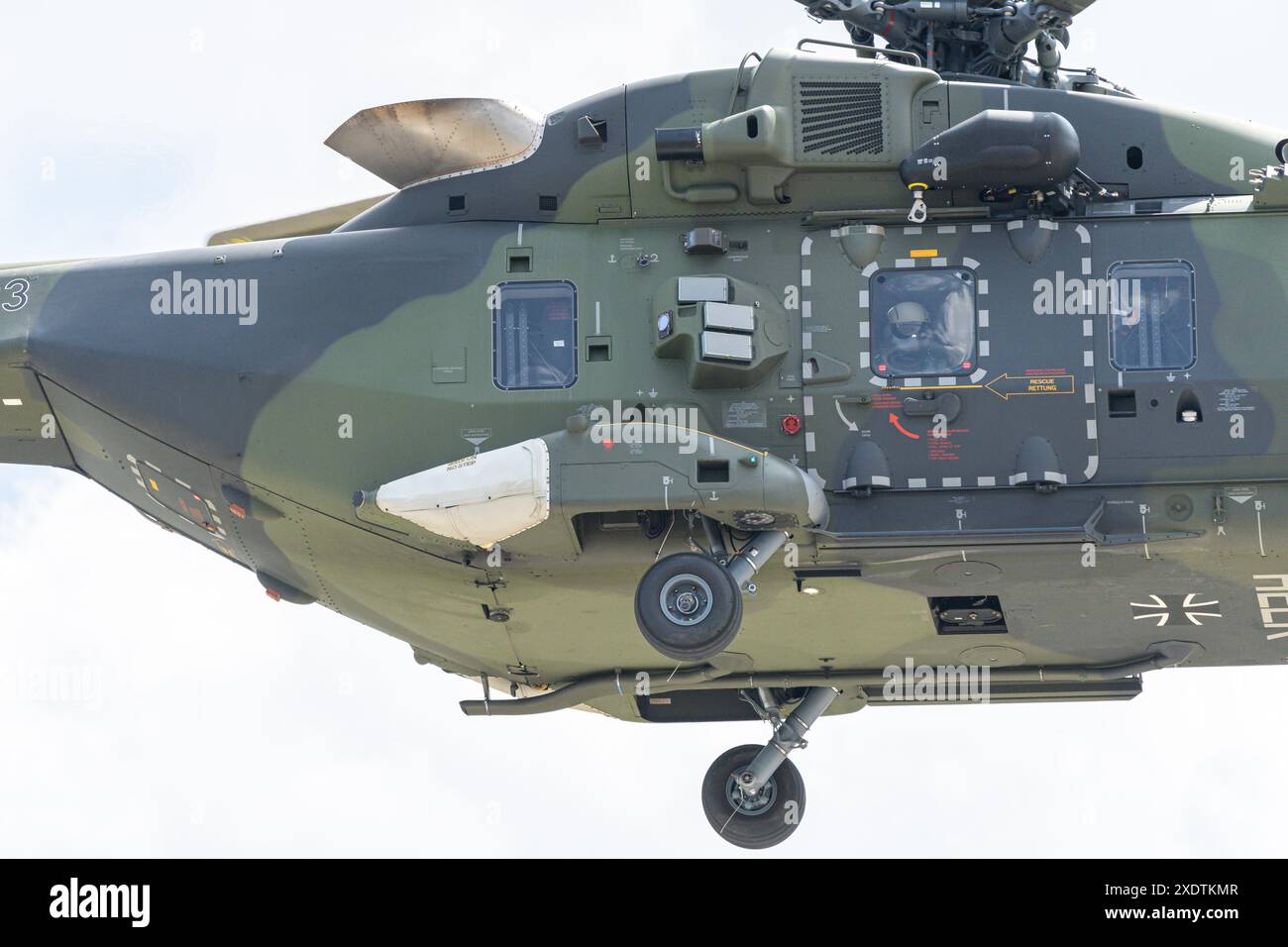 German military transport helicopter, NH 90 flies on airfield in Berlin ...