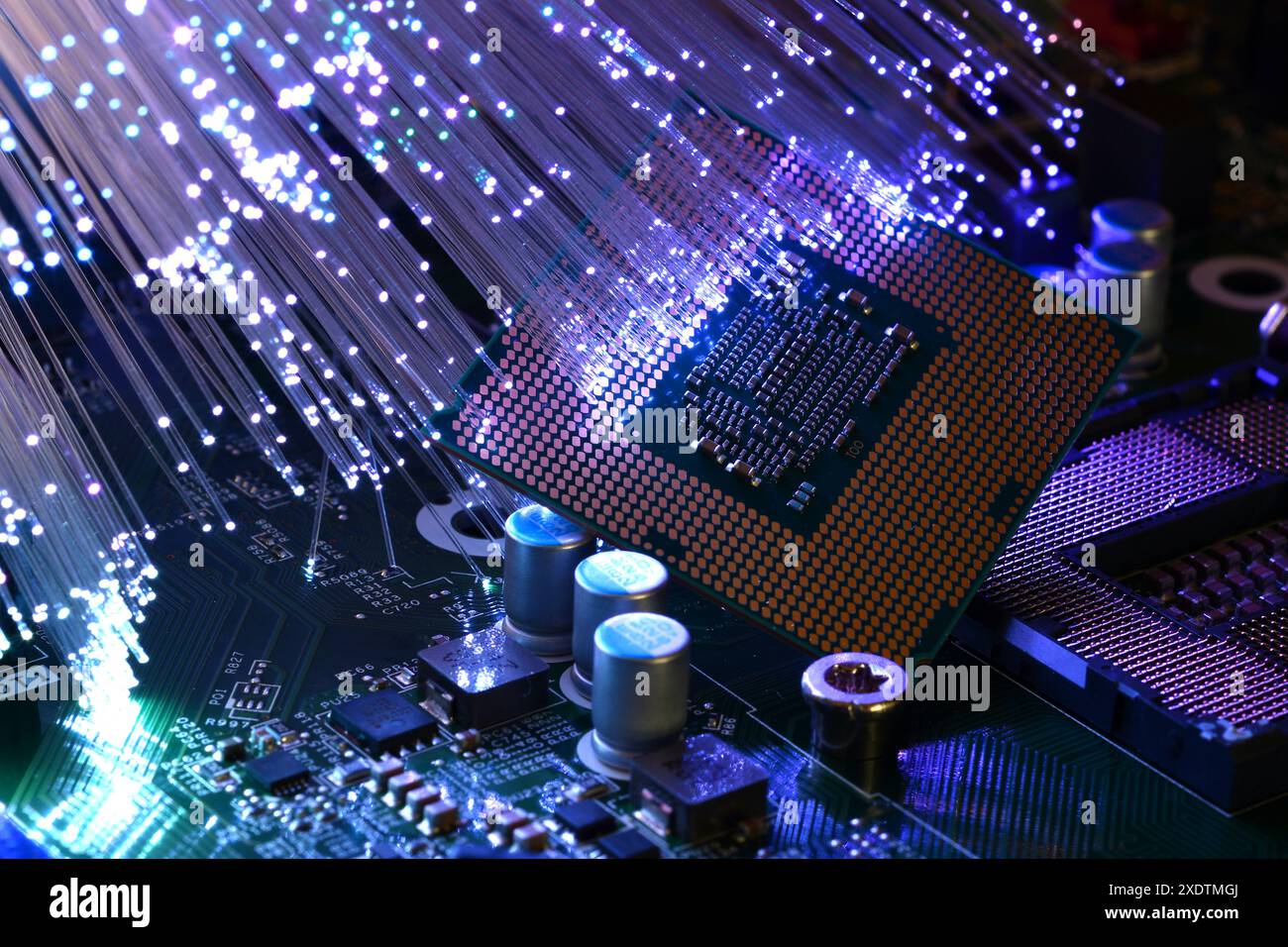 Detail of CPU on socket of a PC motherboard illuminated by a fiber ...