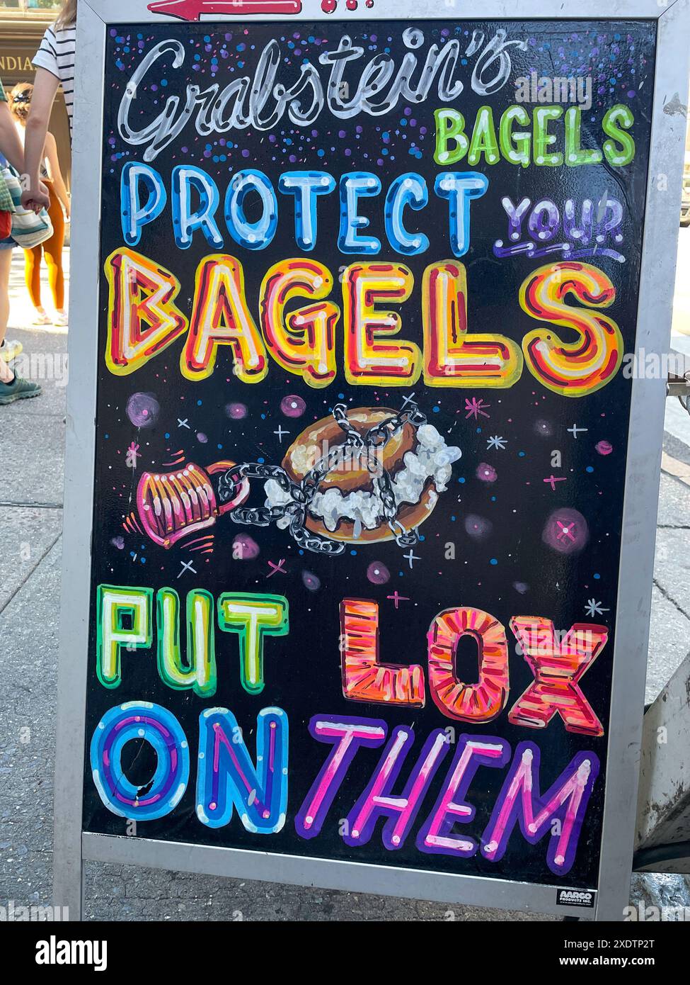 A humorous sidewalk chalkboard advertising bagels and lox., New York ...