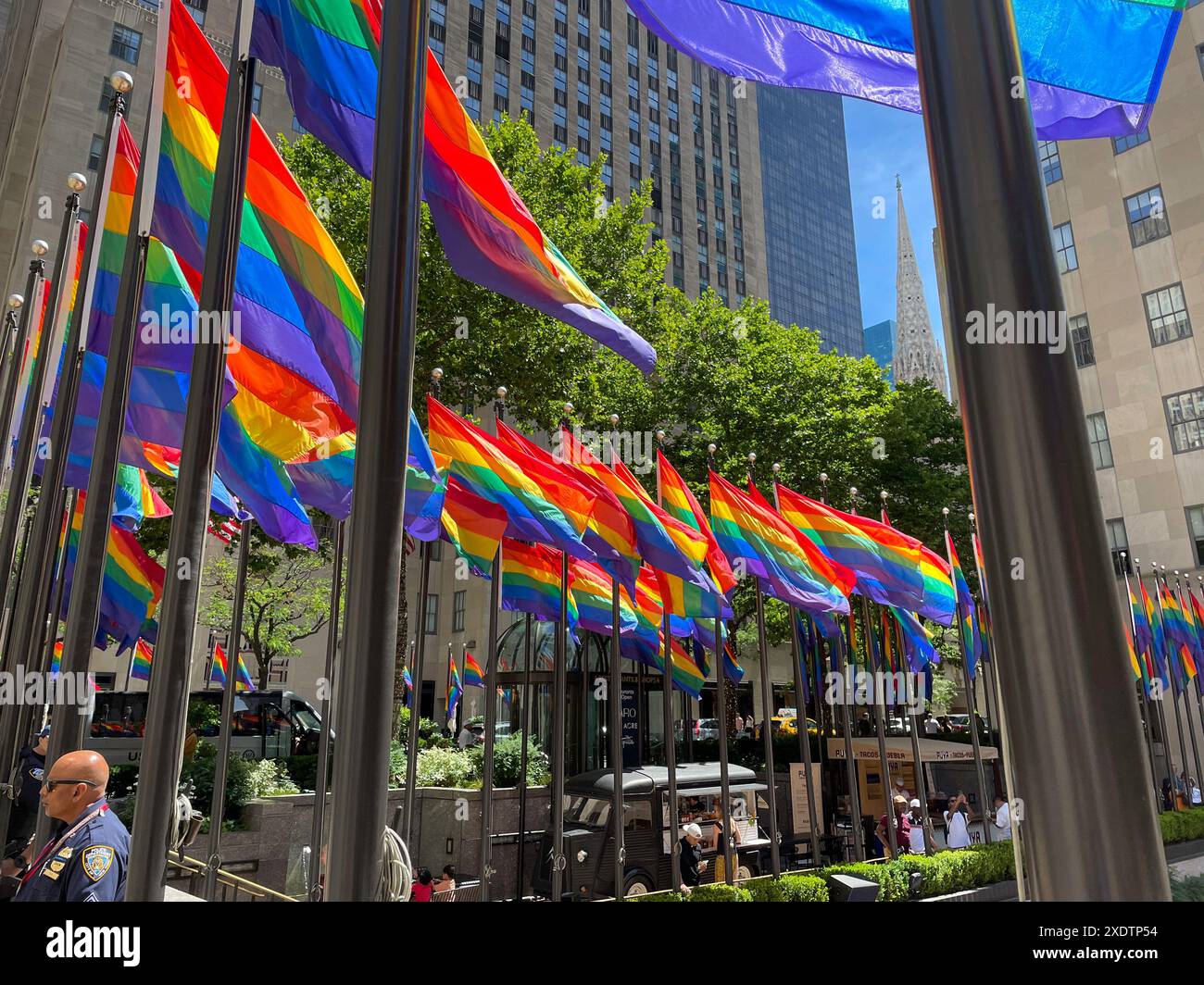 Pride month flags surround the plaza in Rockefeller Center, New York ...