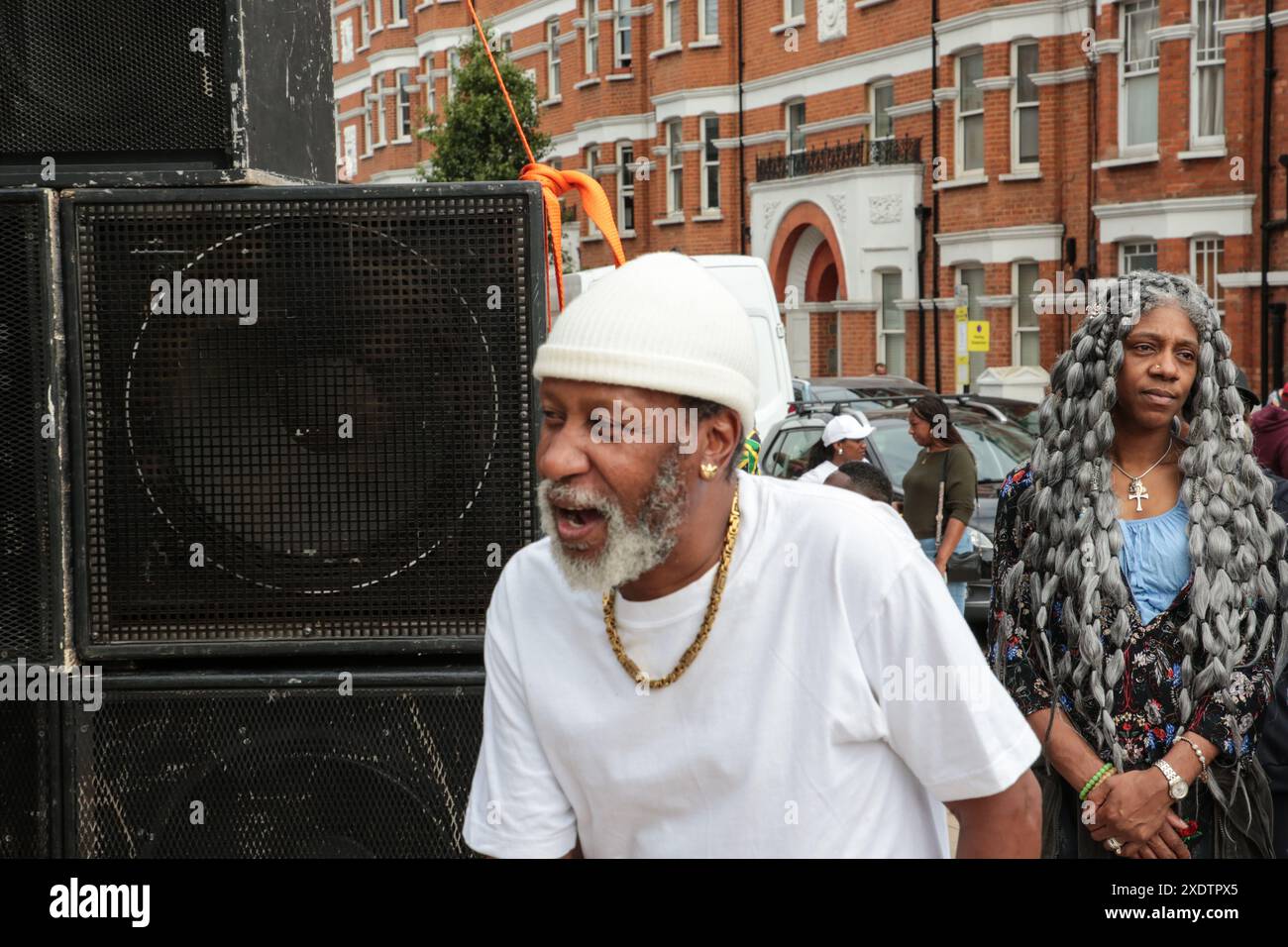 London UK 23 June 2024 A man stands near loud speakers in Windrush ...
