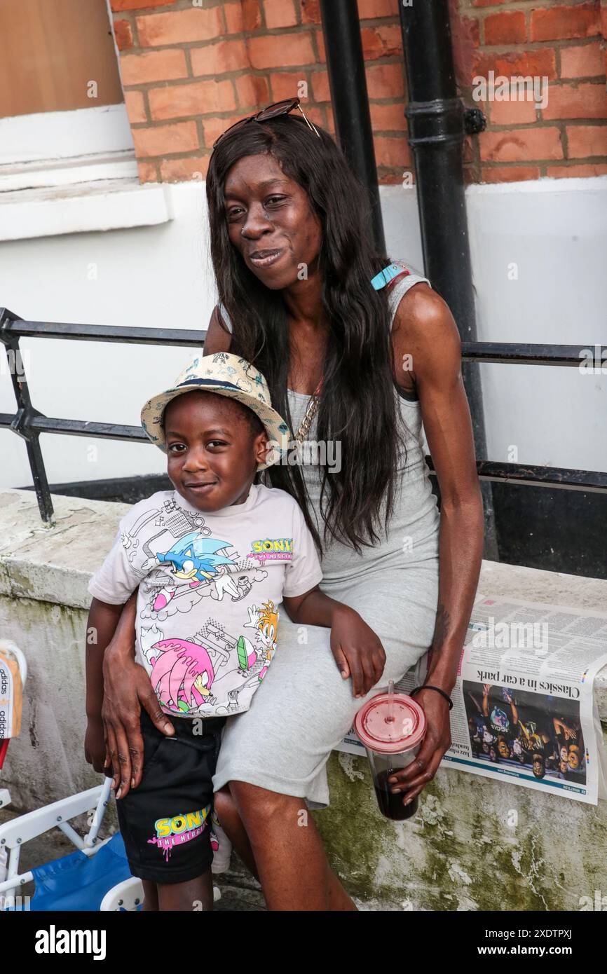 London UK 23 June 2024 A woman and a child in Windrush Square as people ...