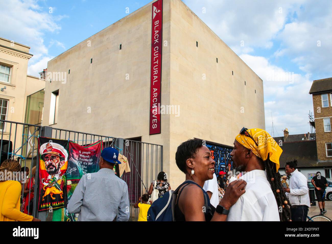 London UK 23 June 2024 People stand outside the Black Cultural Archives in Windrush Square as ...
