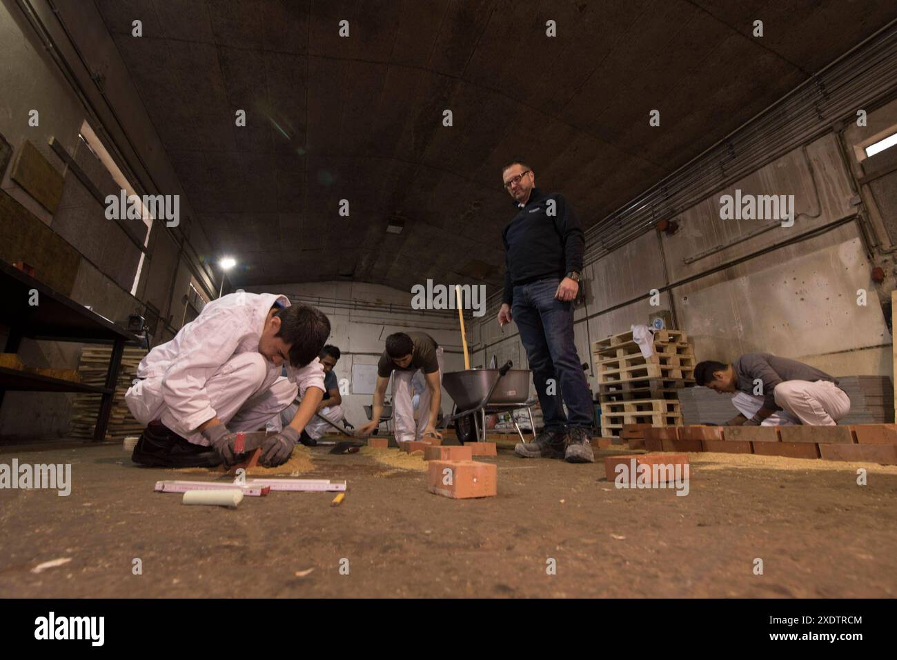 construction worker at a building site, employee in construction ...