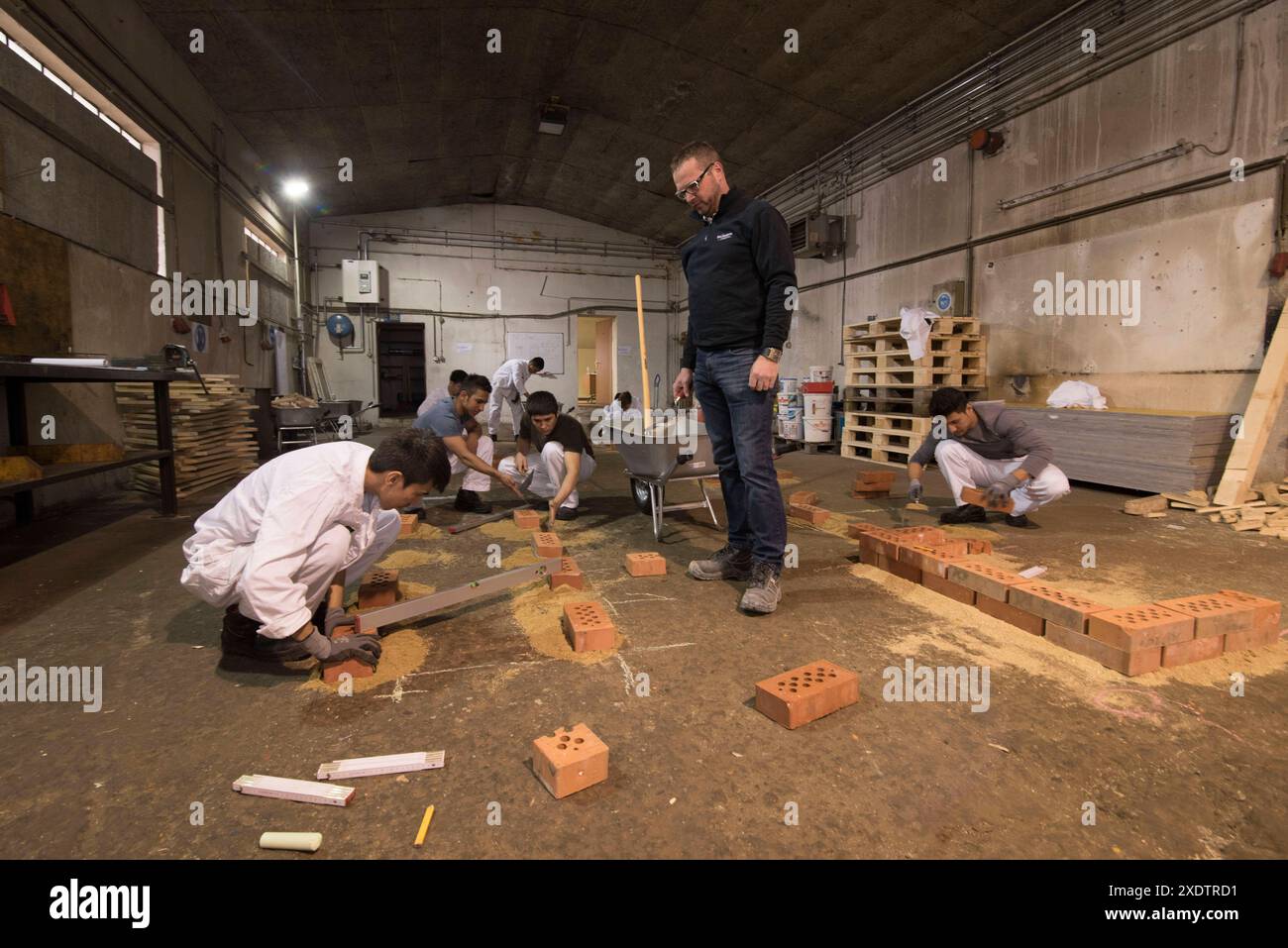 construction worker at a building site, employee in construction ...