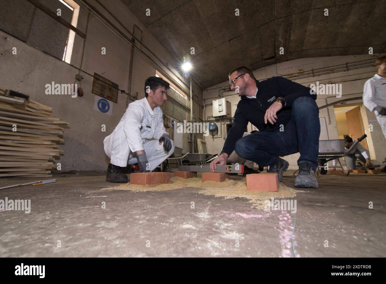 construction worker at a building site, employee in construction ...