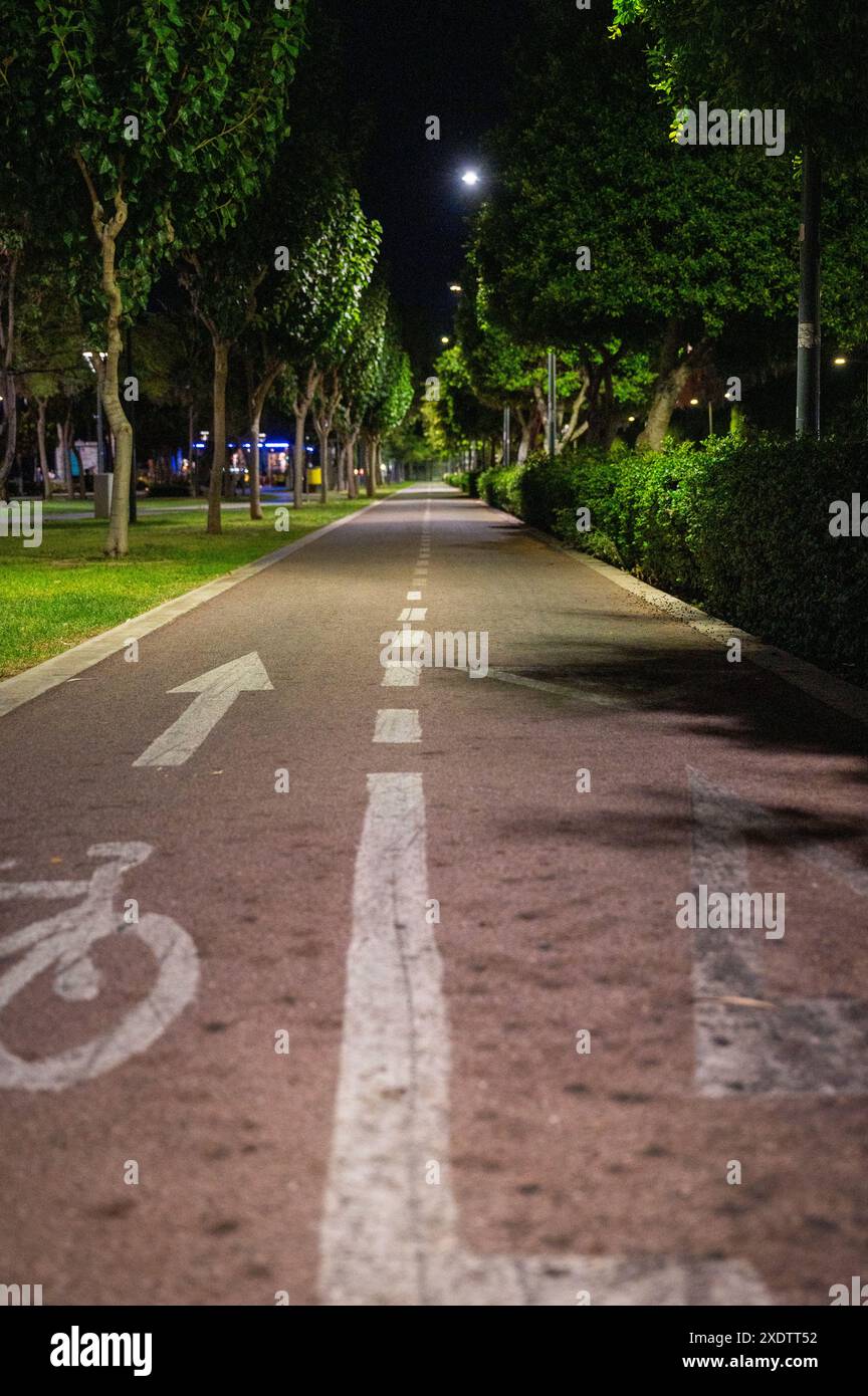 Bike path at night in embankment Molos is a beautiful place in Limassol ...