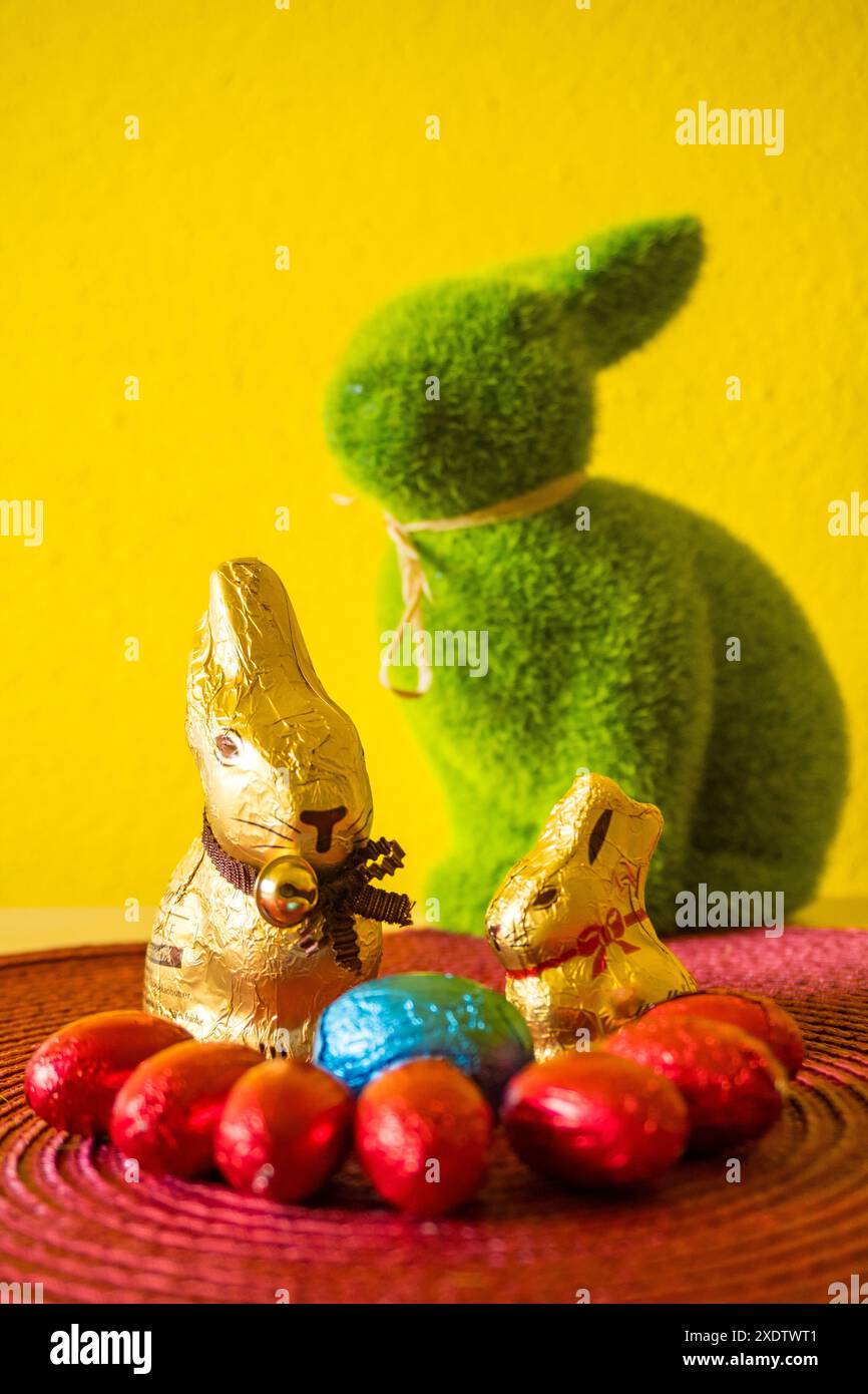 Easter egg hunting background. Various candy and chocolate Easter eggs ...