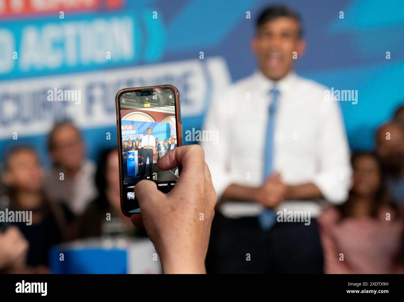 A close up of the screen of an audiences members phone as Prime ...