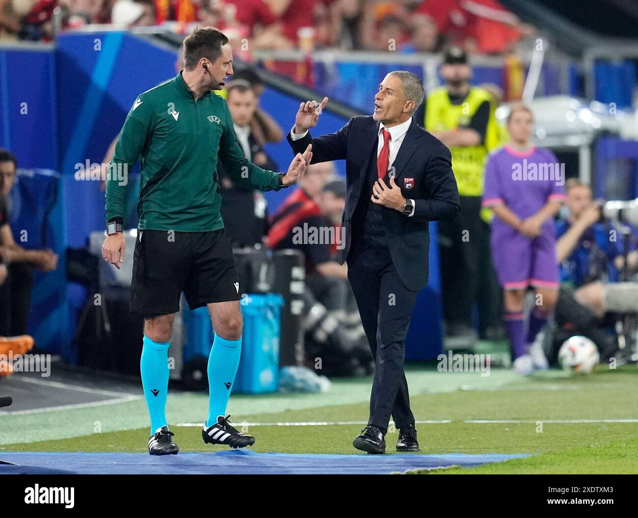 Albania manager Sylvinho argues withe the 4th official during the UEFA ...