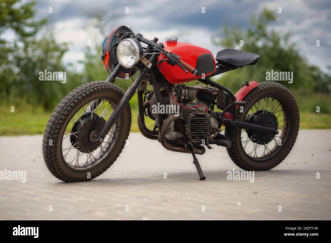 Old red motorcycle in the parking lot Stock Photo - Alamy