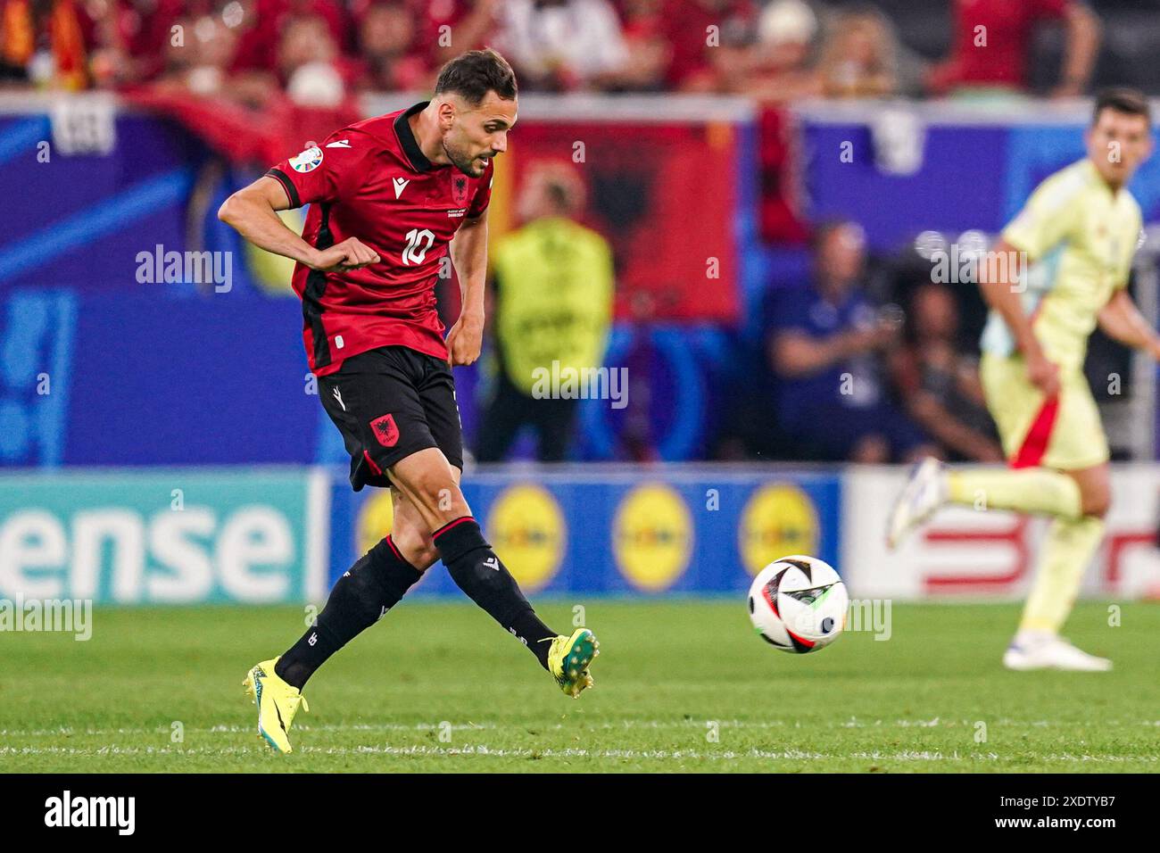 DUSSELDORF, GERMANY - JUNE 24: Nedim Bajrami of Albania makes a pass ...