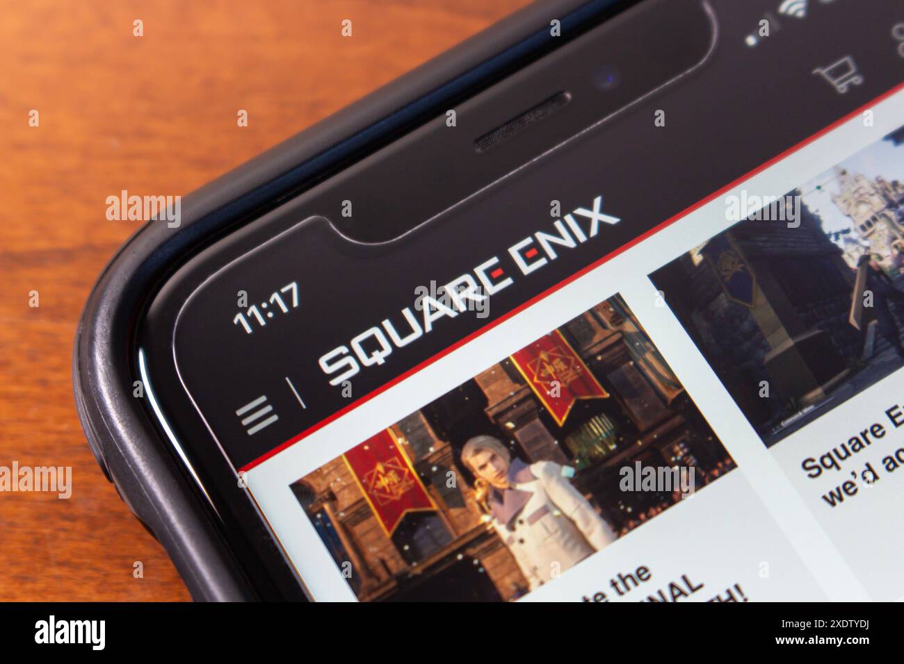 Square Enix company website seen in an iPhone. Leading Japanese game ...