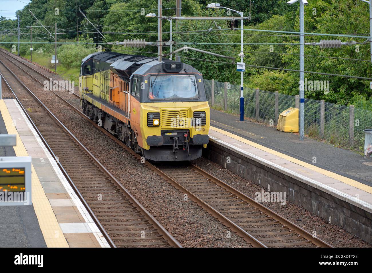 A class 70 Colas diesel locomotive - 70812 - passing Longniddry Station ...
