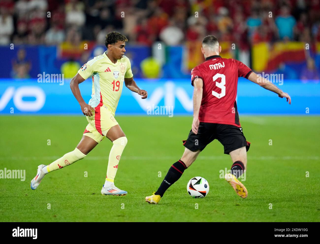 Spain's Lamine Yamal (left) and Albania's Mario Mitaj battle for the ...