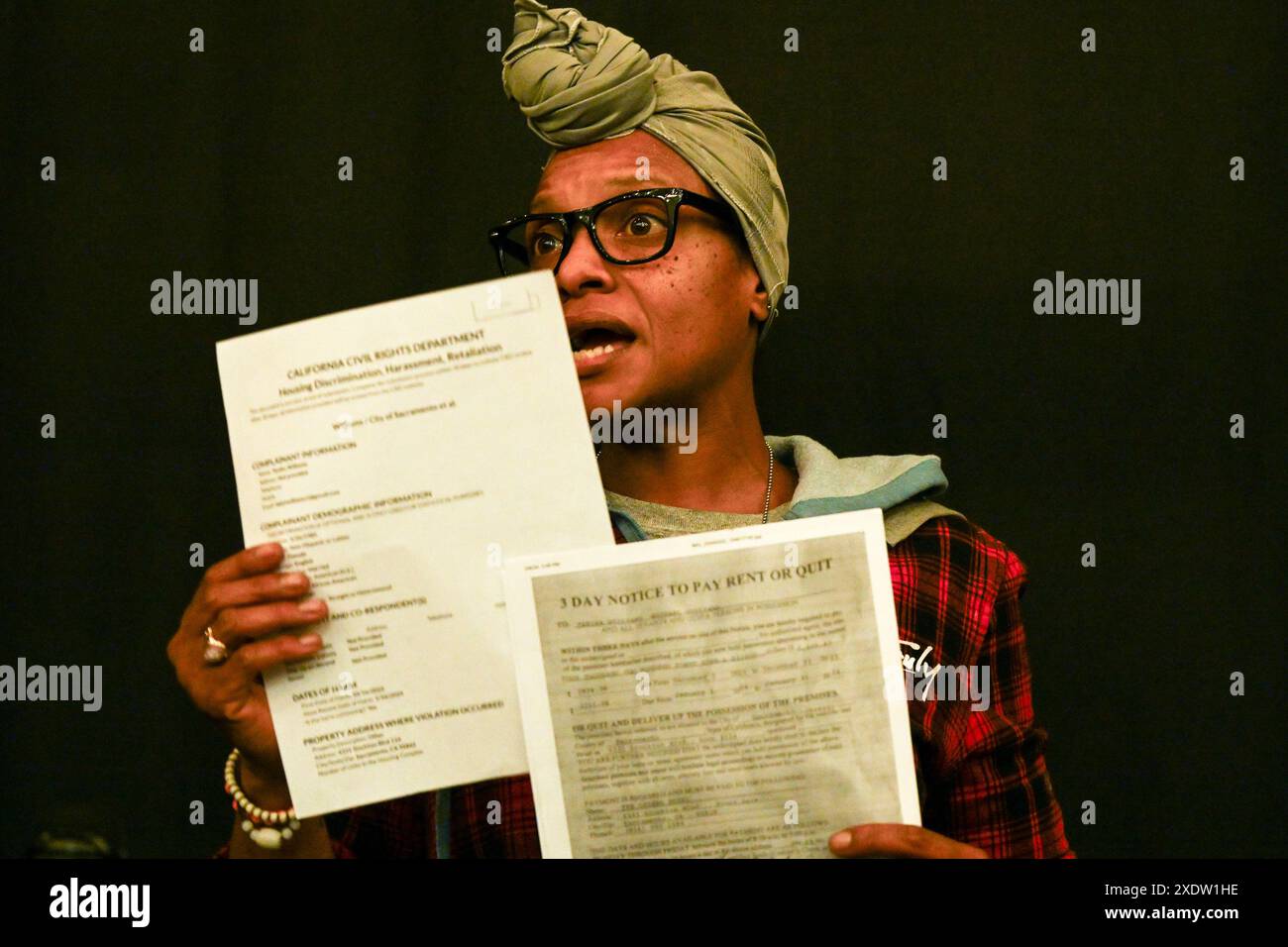 Sacramento, Ca. 14th Feb, 2024. Tanika Williams, 38, holds paperwork ...