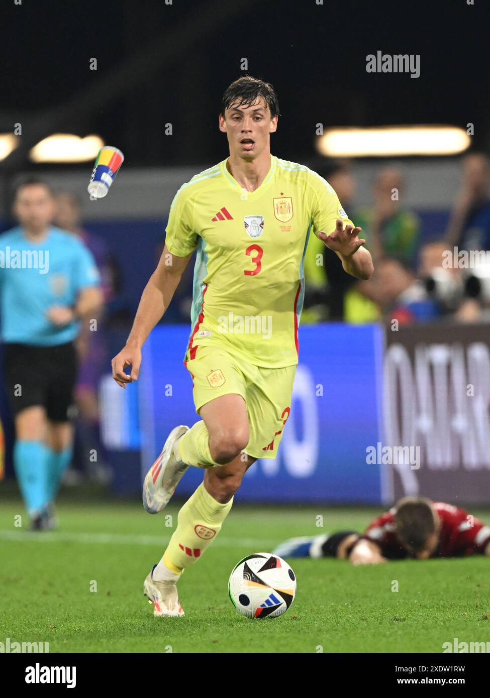 DUSSELDORF - Robin Le Normand of Spain almost gets hit by a cup during ...