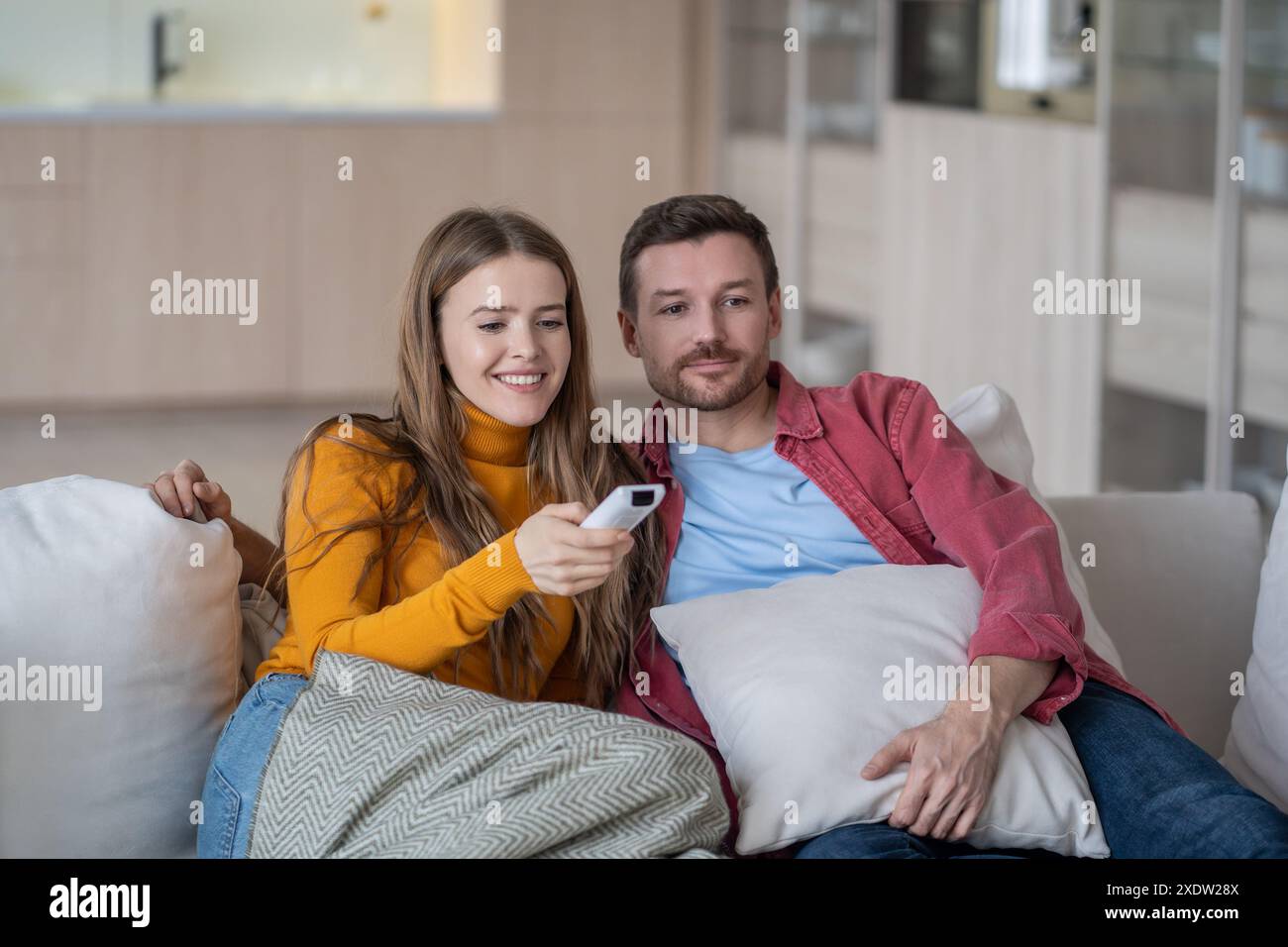 Watching tv show together hi-res stock photography and images - Alamy