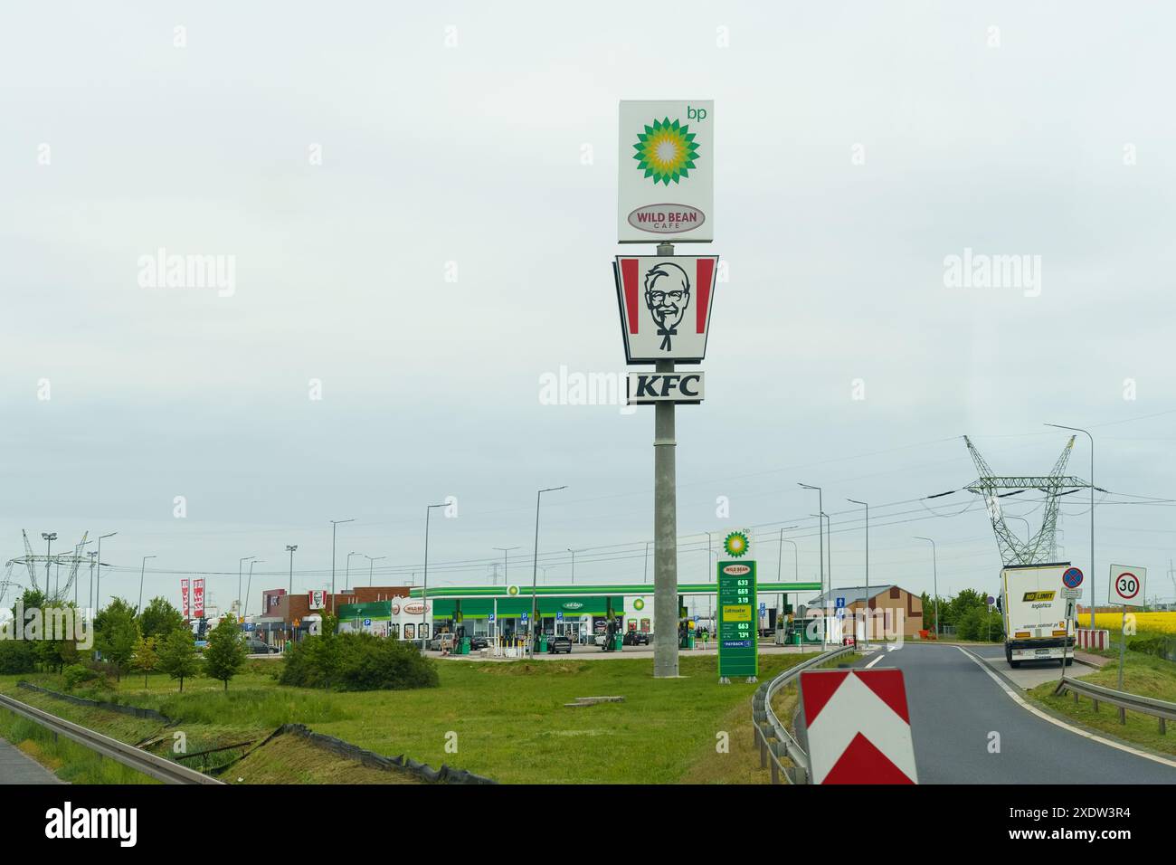 Poznan, Poland - May 19, 2023: A towering sign includes logos for BP ...