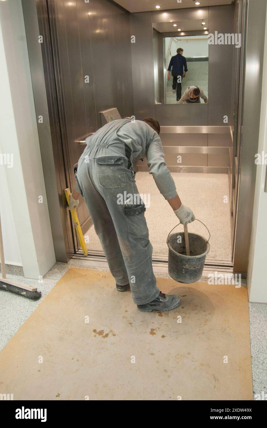 construction worker at a building site, employee in construction ...