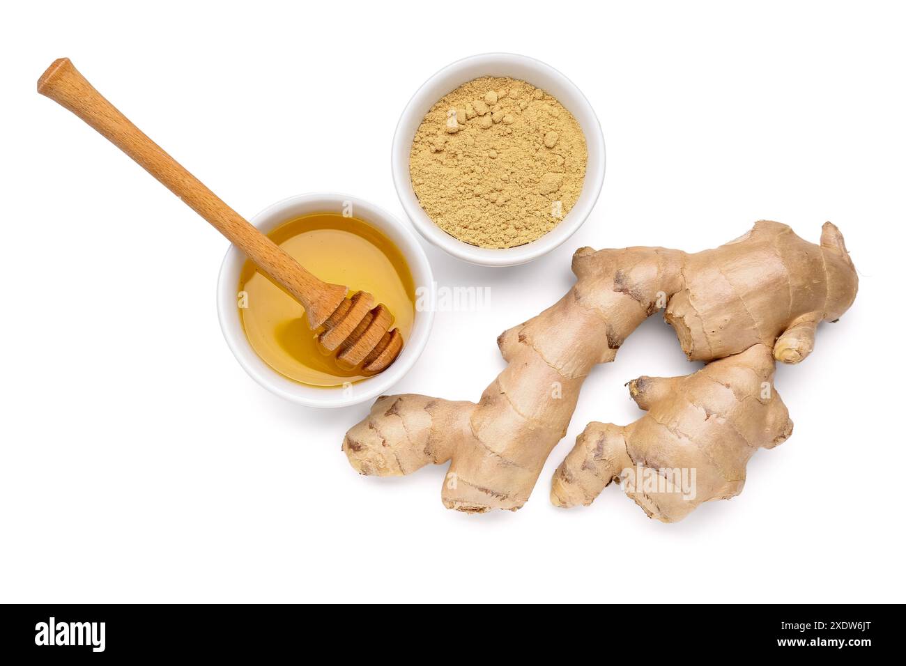 Fresh ginger root and bowl with dried powder on white background Stock ...