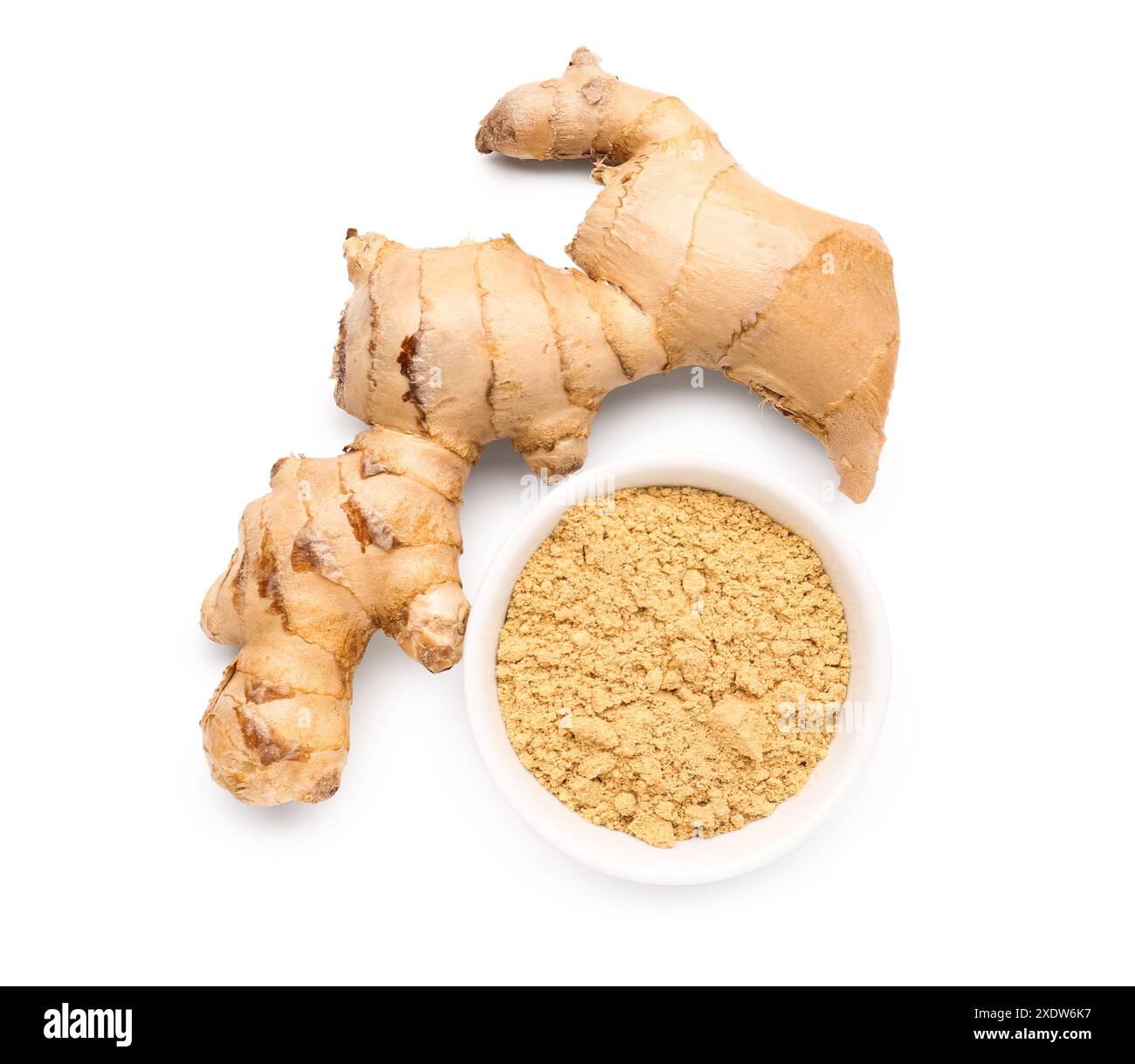 Fresh ginger root and bowl with dried powder on white background Stock ...