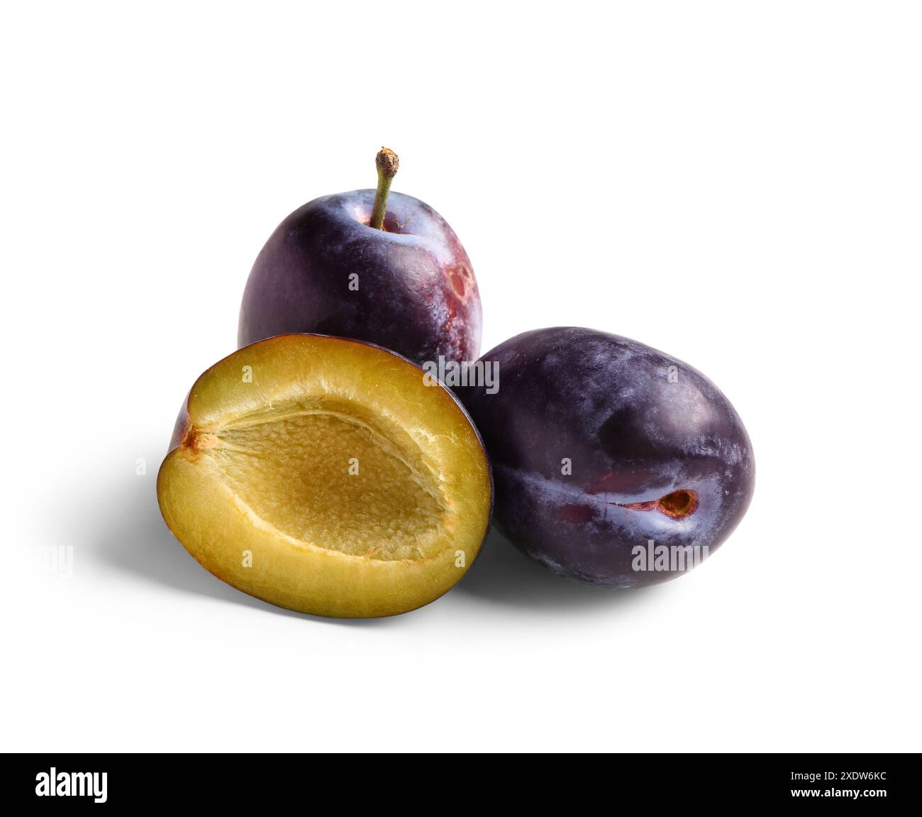 Ripe plums on white background Stock Photo - Alamy
