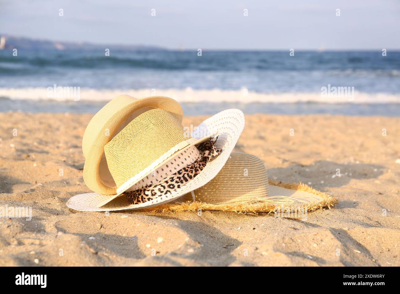 Different stylish straw hats hi-res stock photography and images - Alamy